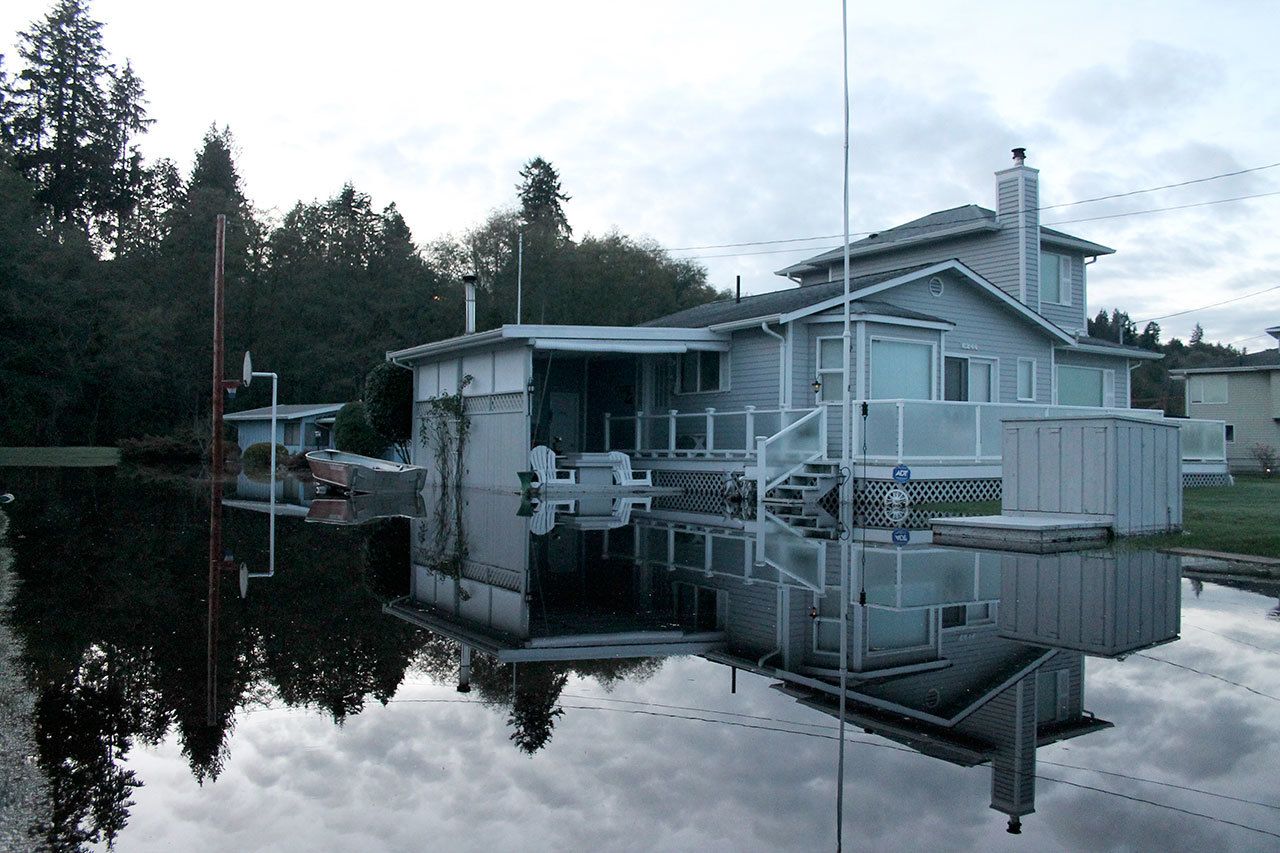 Torrential downpour breaches Brighton Beach berm in Clinton | South ...