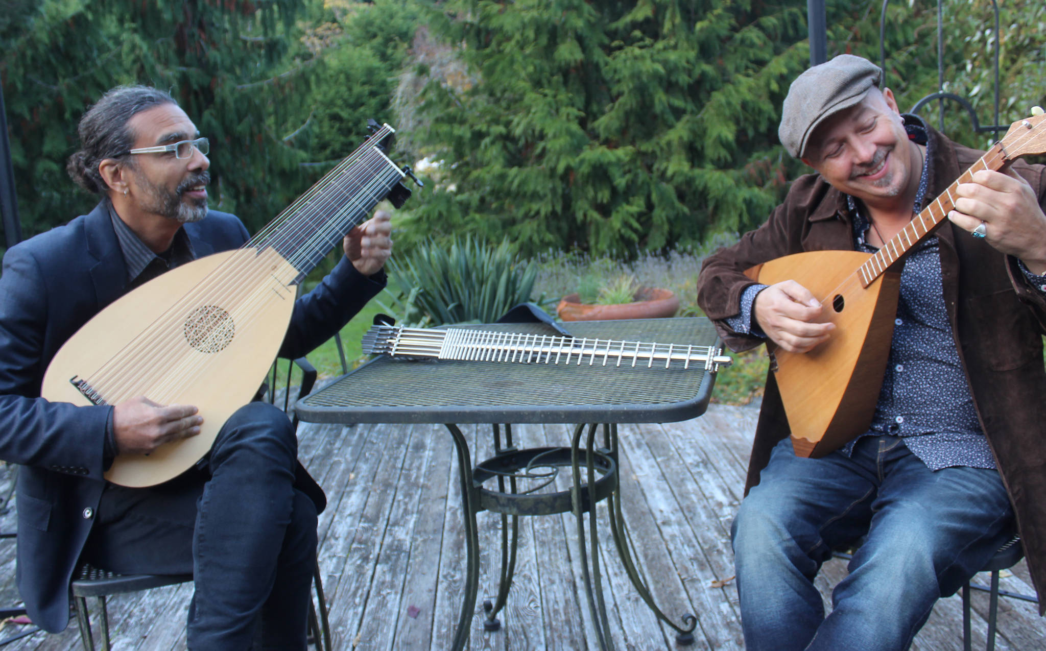 Stringing the world together: Two guitar masters perform together at ...